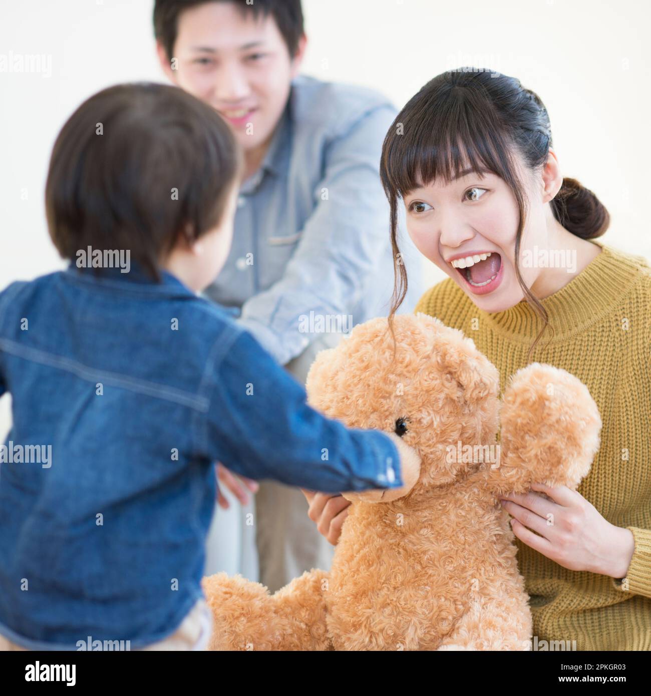 Boy rushing to his parents Stock Photo - Alamy