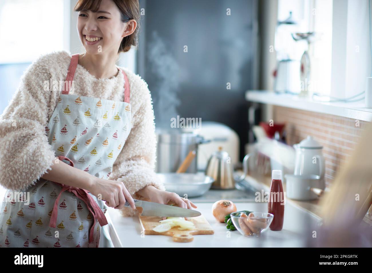 Woman winter vegetables in kitchen hi-res stock photography and images ...