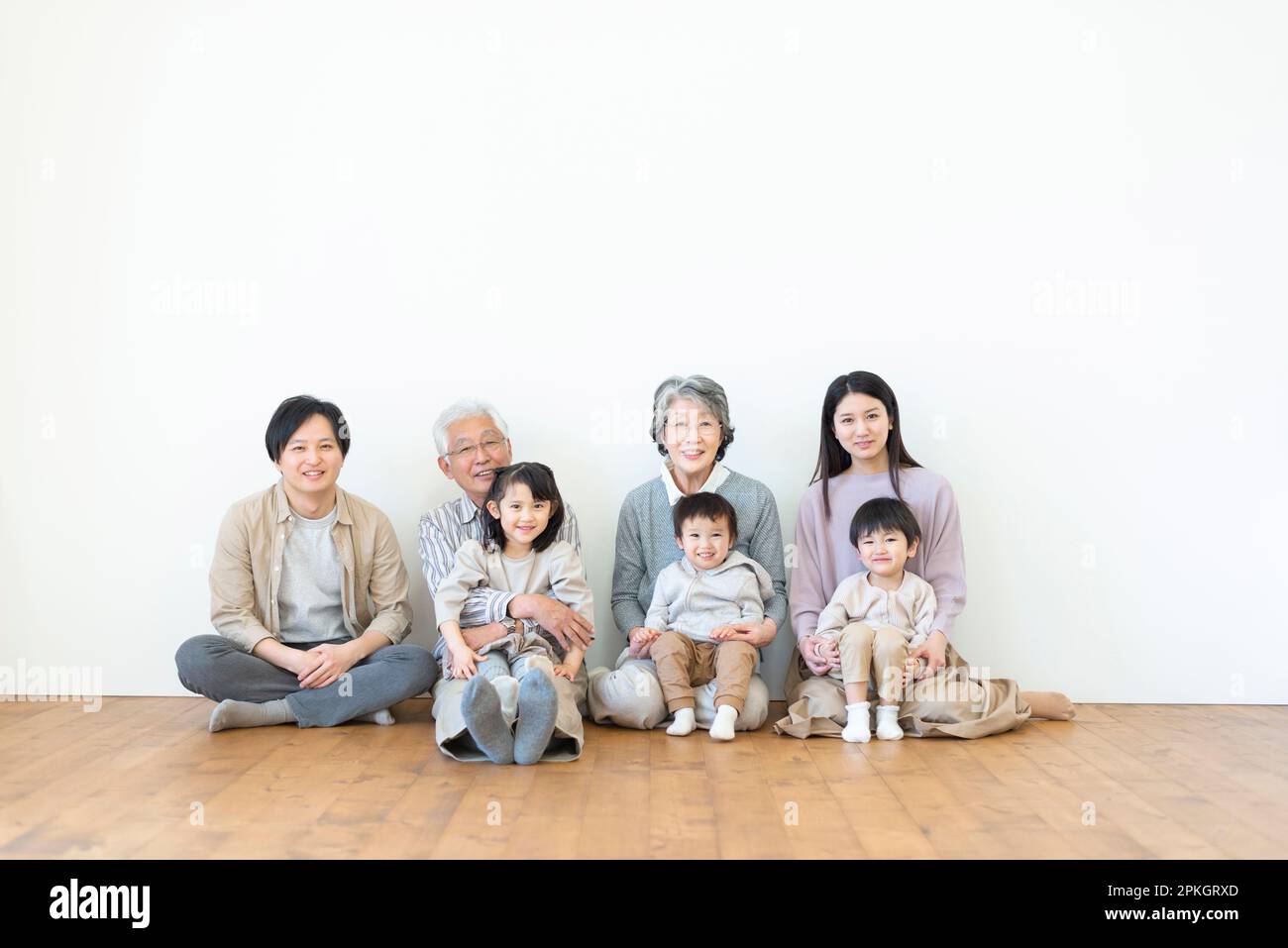 Smiling family of 3 generations Stock Photo - Alamy