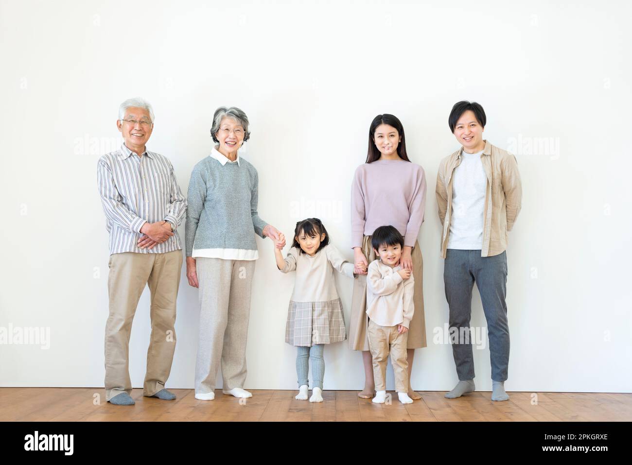 Smiling family of 3 generations Stock Photo - Alamy