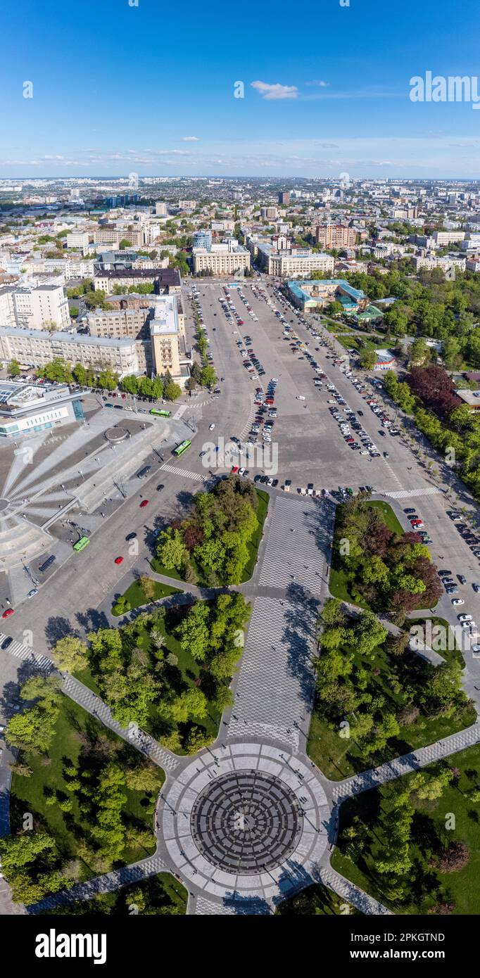 Long vertical aerial panorama on Freedom (Svobody) Square with a circle ...