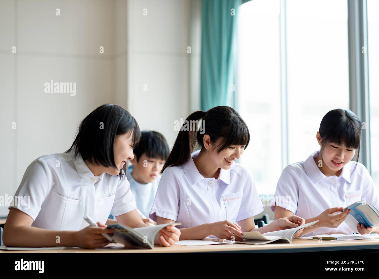 A nursing student taking a class in a classroom Stock Photo - Alamy