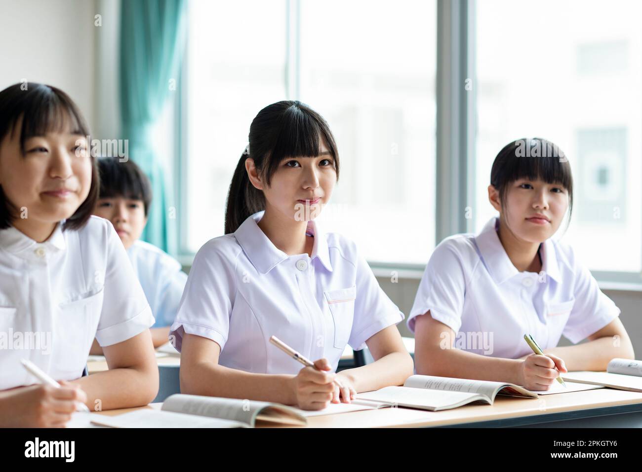 Nursing student taking a class in a classroom Stock Photo - Alamy