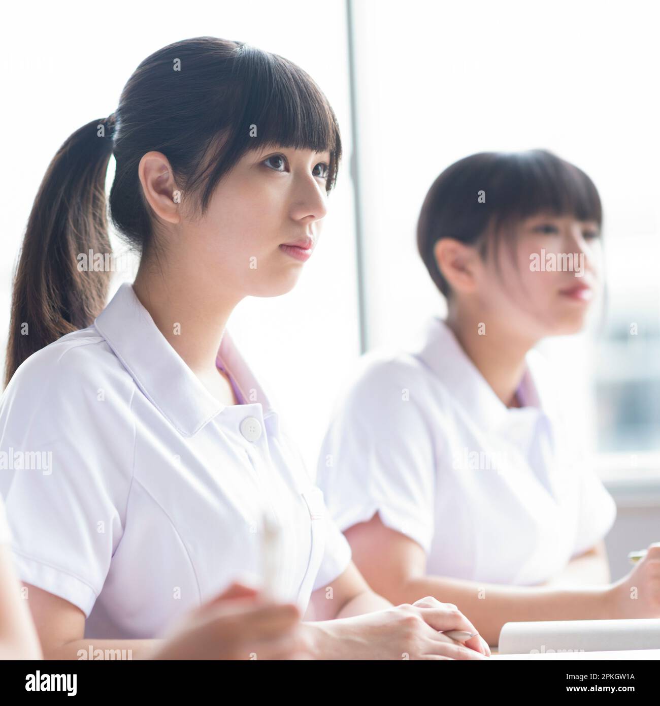 Nursing students taking a class in a classroom Stock Photo - Alamy