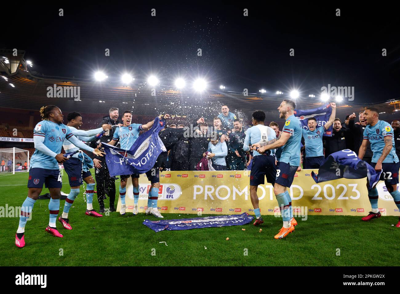 Burnley players celebrate promotion to the Premier League following ...