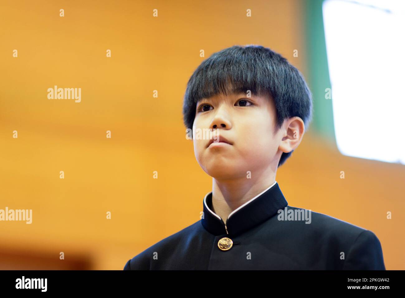 A male student making a serious face in the gymnasium Stock Photo - Alamy