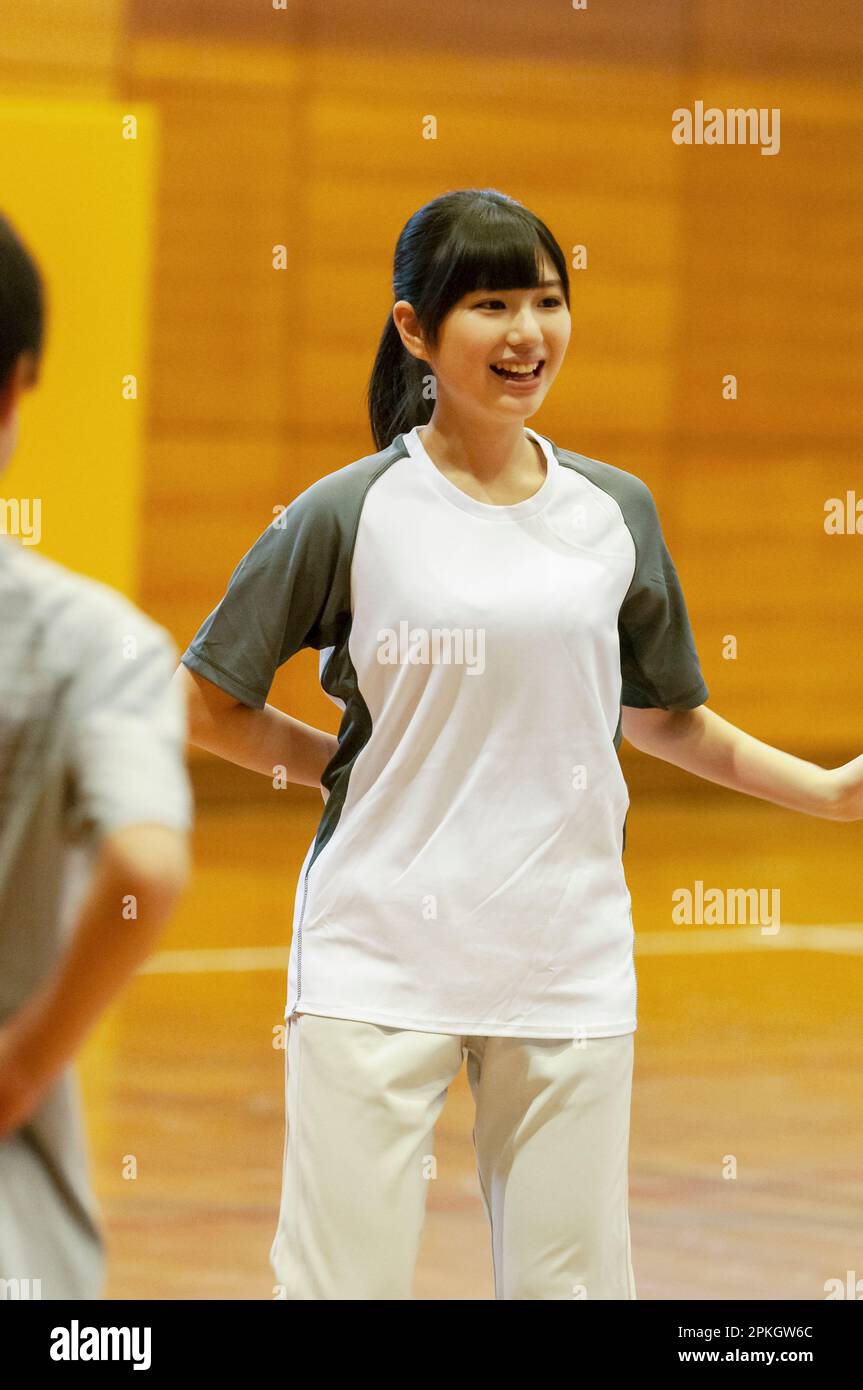 Female student dancing in gymnasium Stock Photo - Alamy