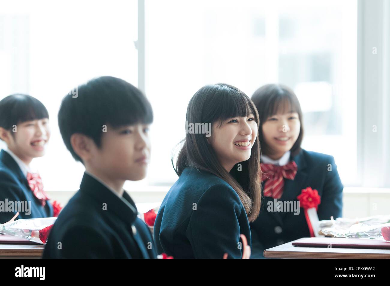 A student smiling in class Stock Photo - Alamy