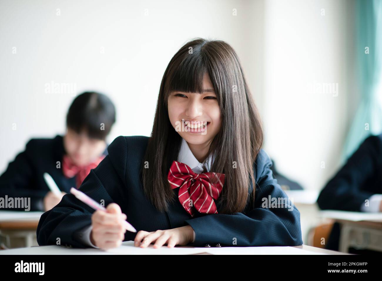 Female students taking a class in a classroom Stock Photo - Alamy