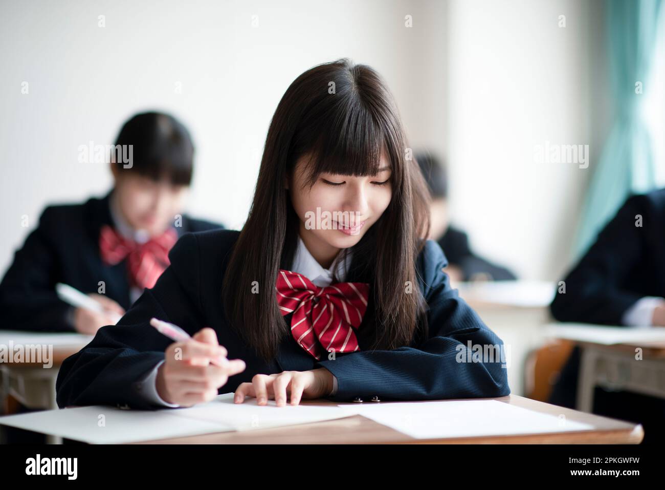 Female students taking a class in a classroom Stock Photo - Alamy