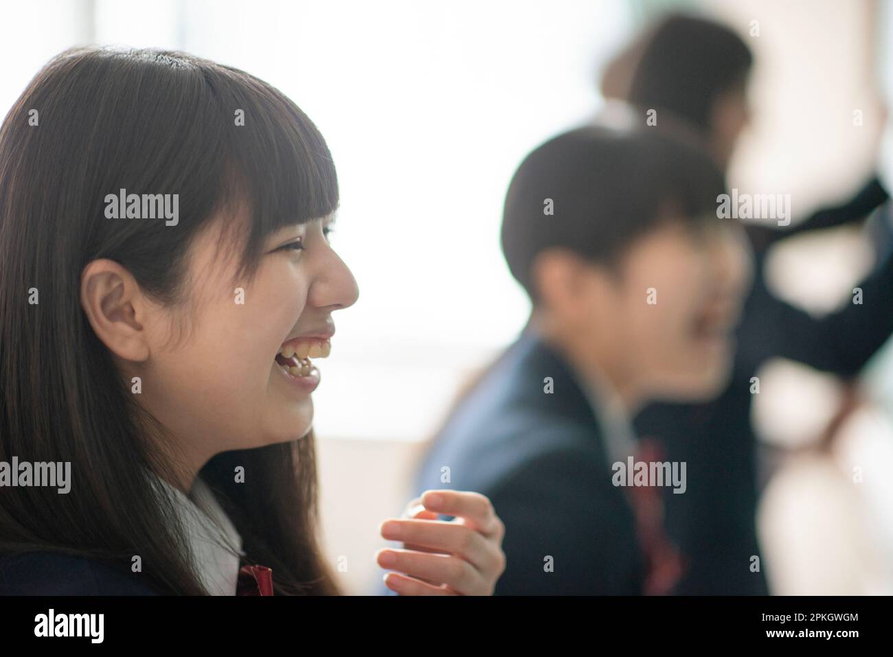 Female student smiling in the classroom Stock Photo - Alamy