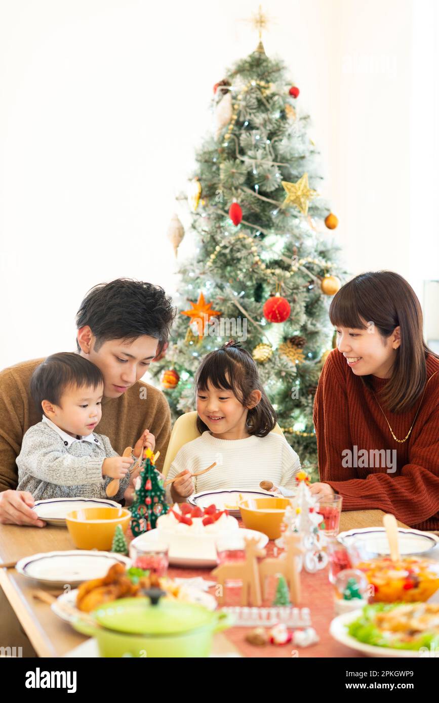 Family having a Christmas party Stock Photo - Alamy