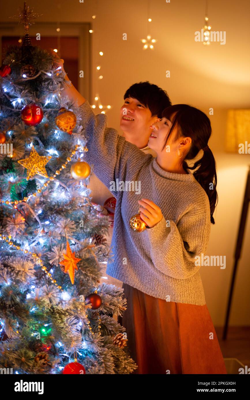 Two at a party christmas talking hi-res stock photography and images ...