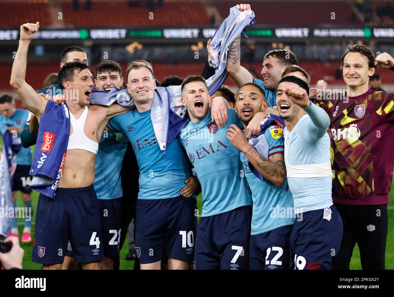 Burnley players celebrate promotion to the Premier League following ...