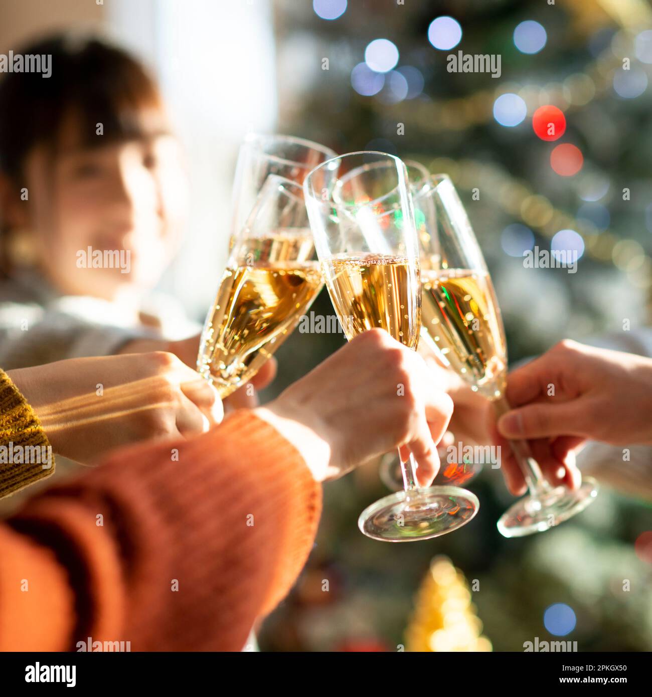Young people making a toast Stock Photo - Alamy