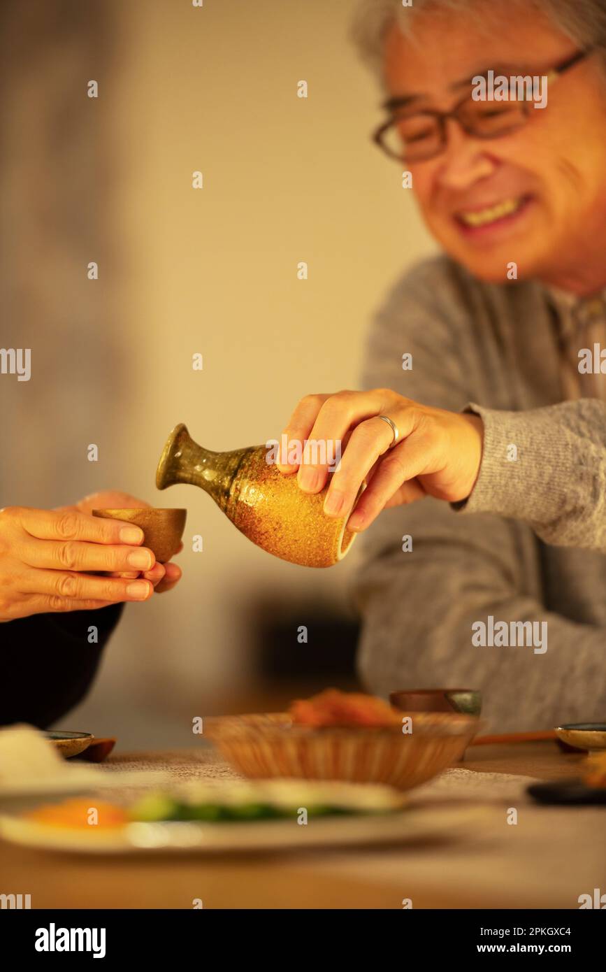 Senior couple relaxing having hi-res stock photography and images - Alamy