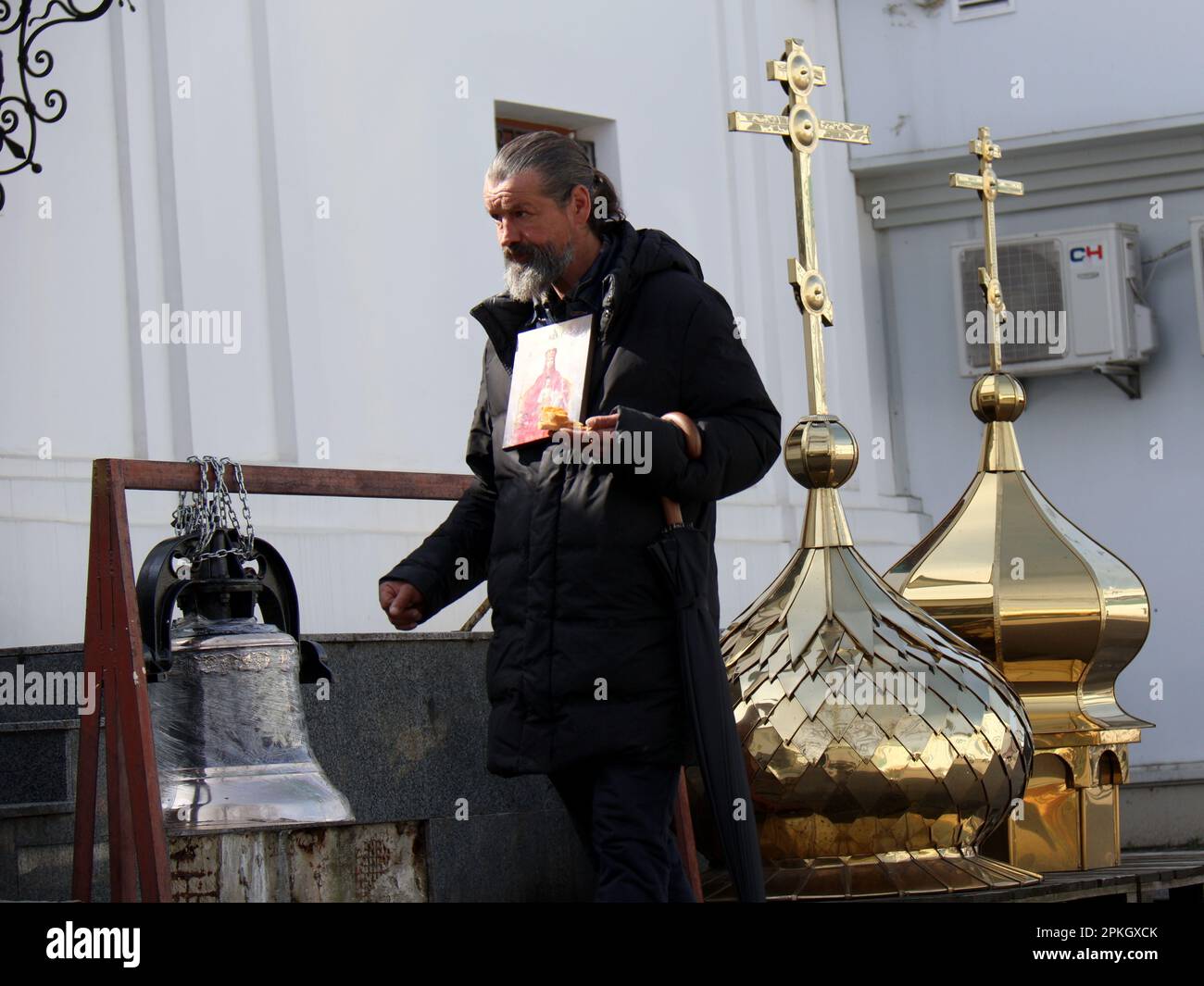 KYIV, UKRAINE - APRIL 07, 2023 - A priest is seen on the territory of ...