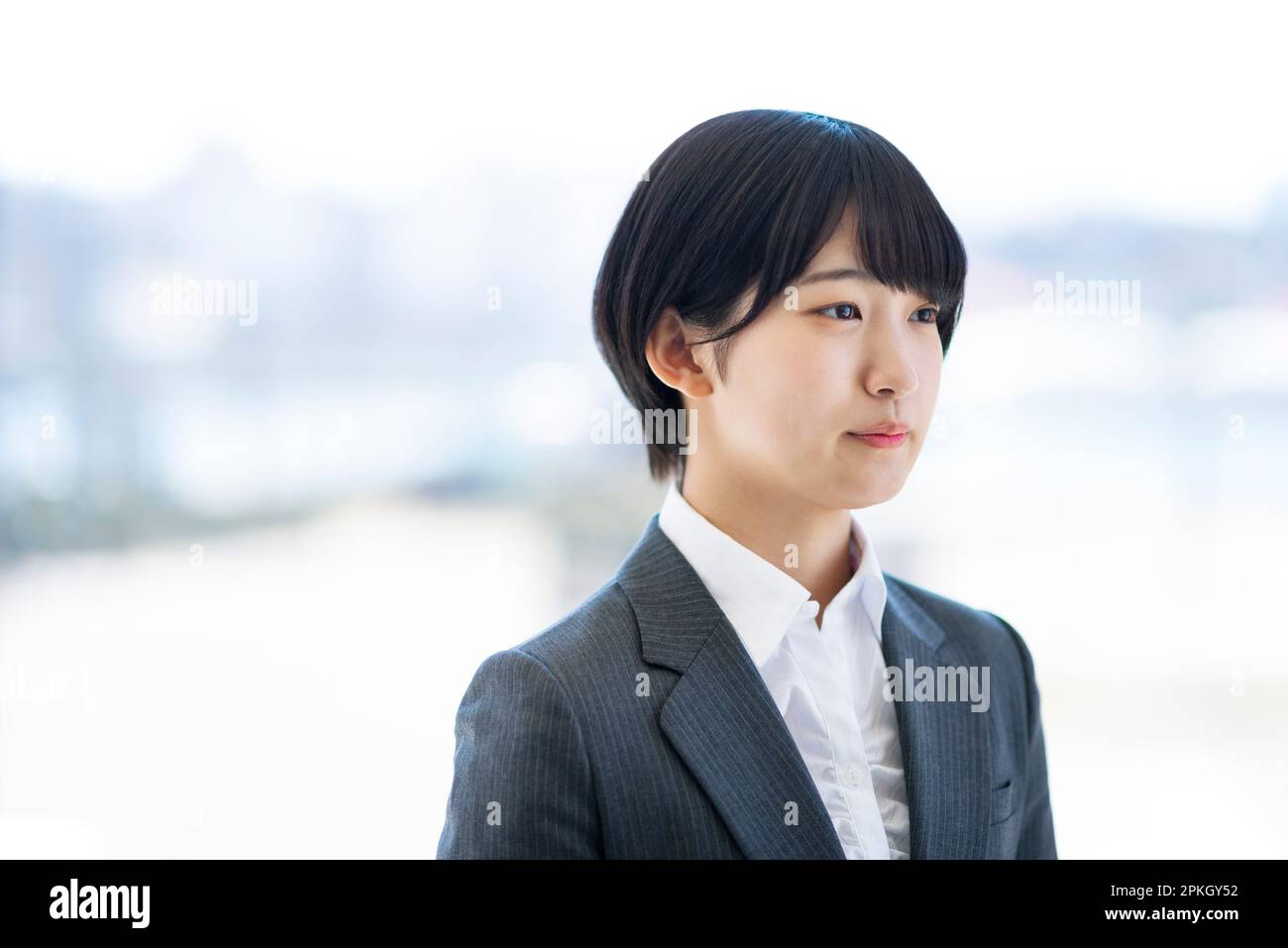 Office asian woman serious face hi-res stock photography and images - Alamy