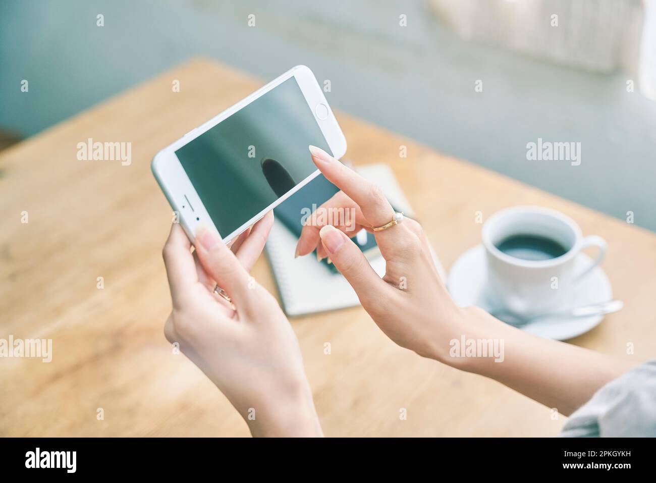 Female hand operating smartphone hi-res stock photography and images ...