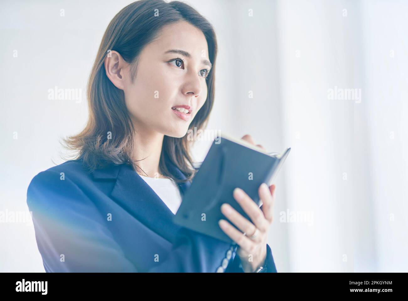 Office asian woman serious interview hi-res stock photography and ...