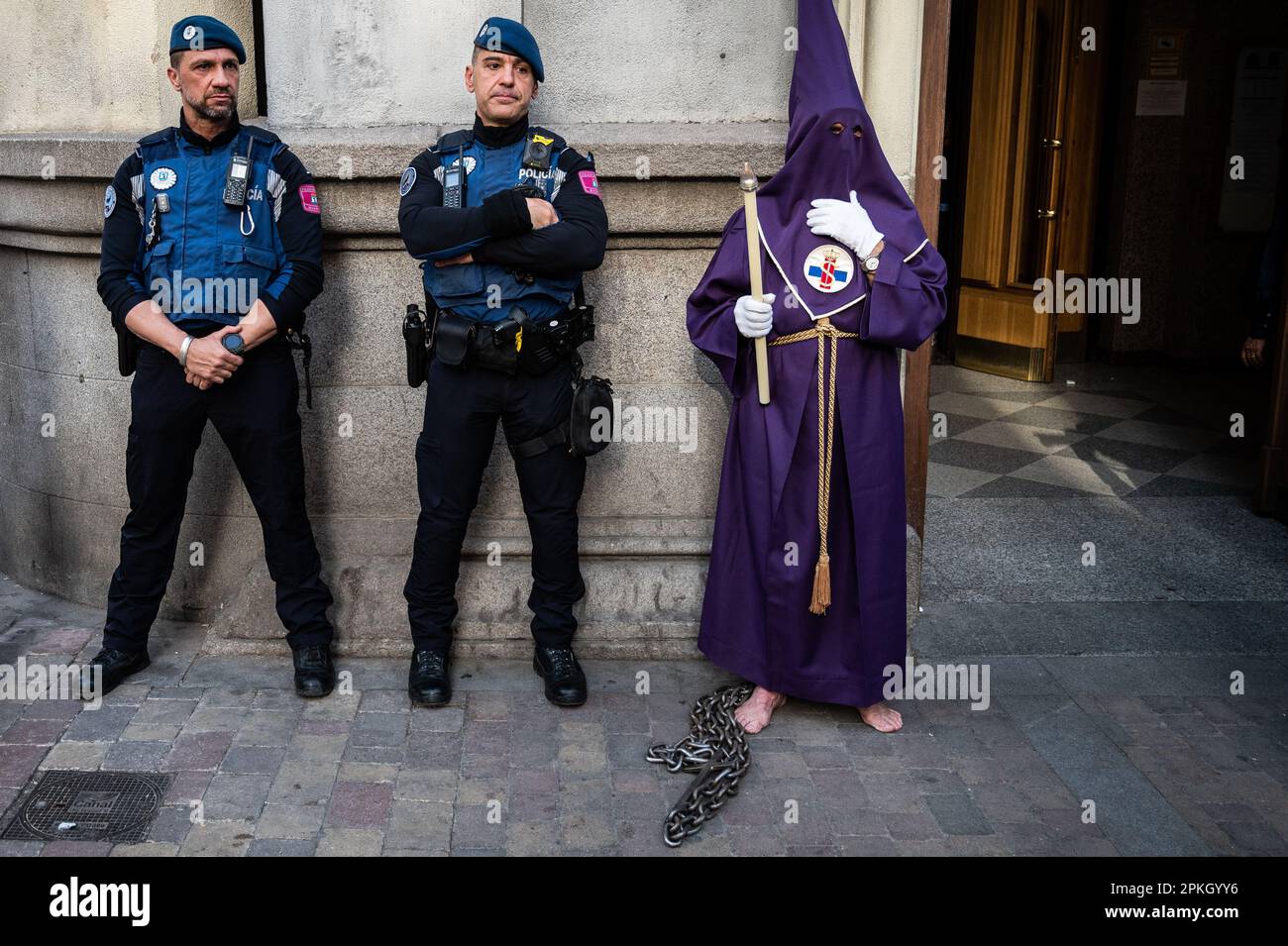 Madrid, Spain. 07th Apr, 2023. A Nazarene penitent is seen barefoot ...