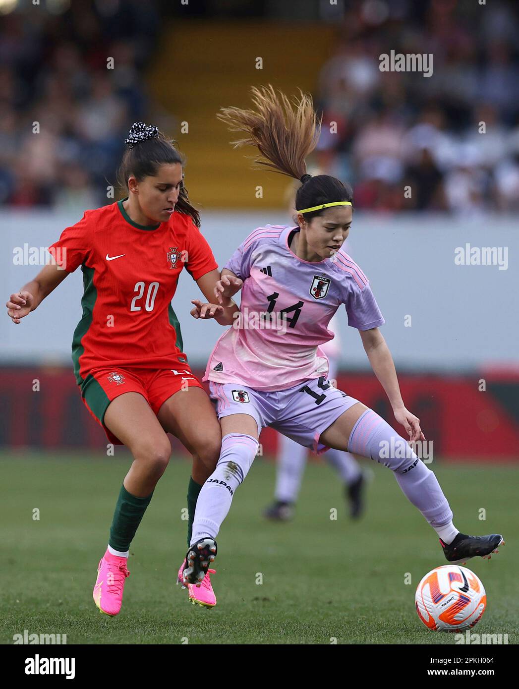 Portugal's Kika Nazareth (L) and Japan's HASEGAWA Yui struggle to hold ...