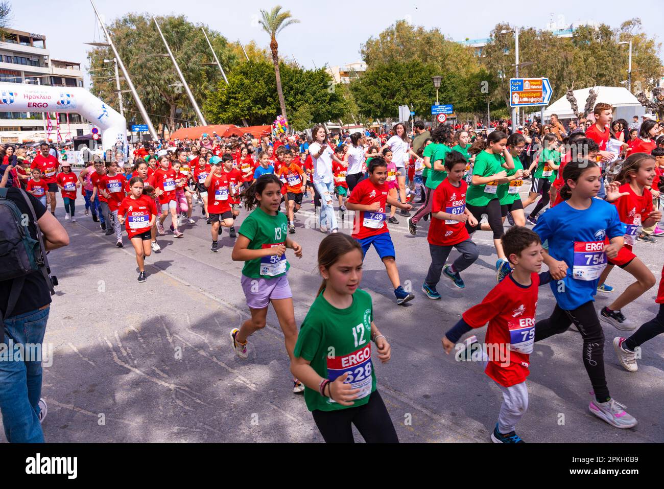 HERAKLION, CRETE, GREECE, APRIL 2, 2023. School children runners ...
