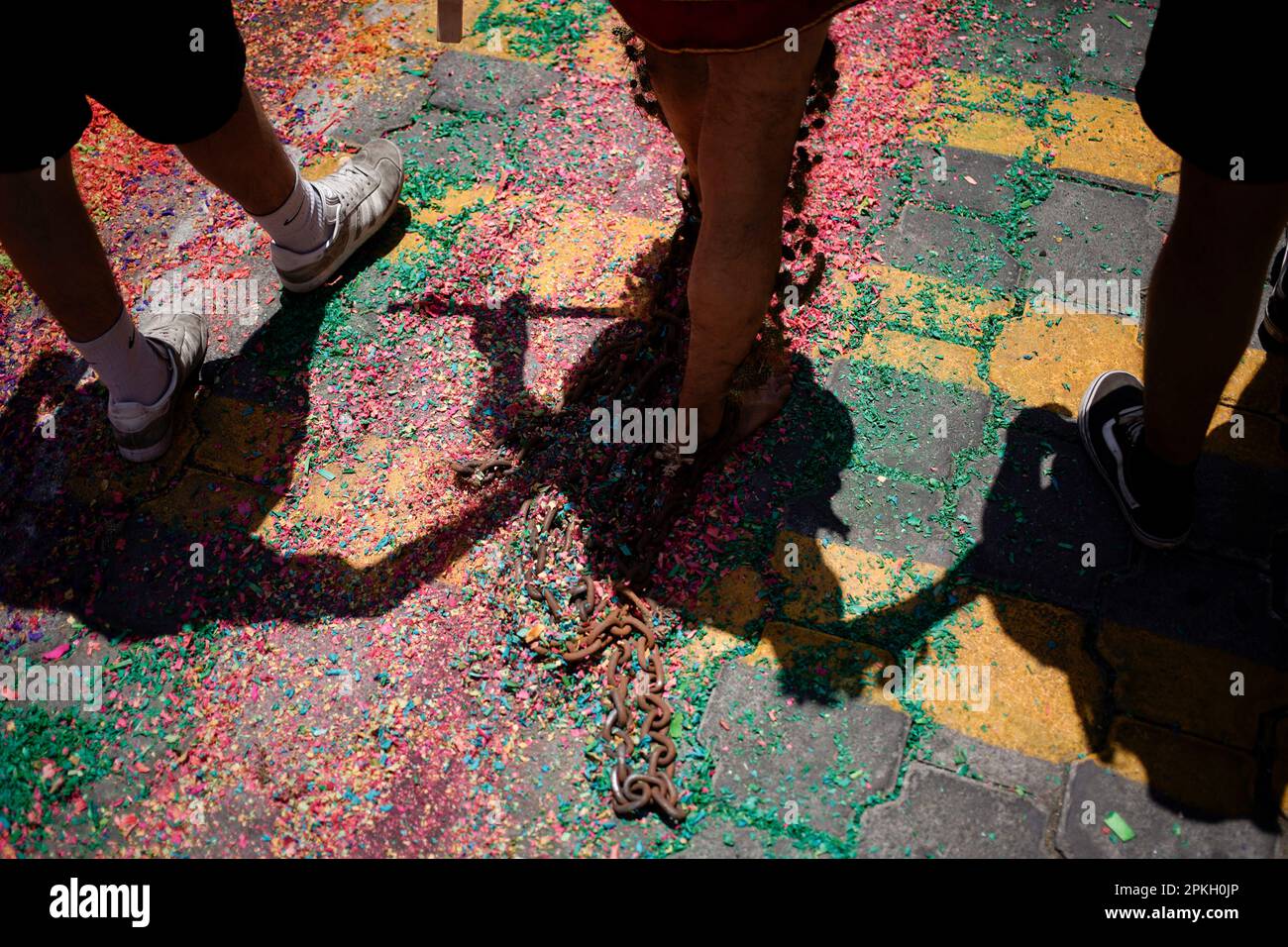 A penitent, wearing chains attached to his ankles, takes part in a Good ...