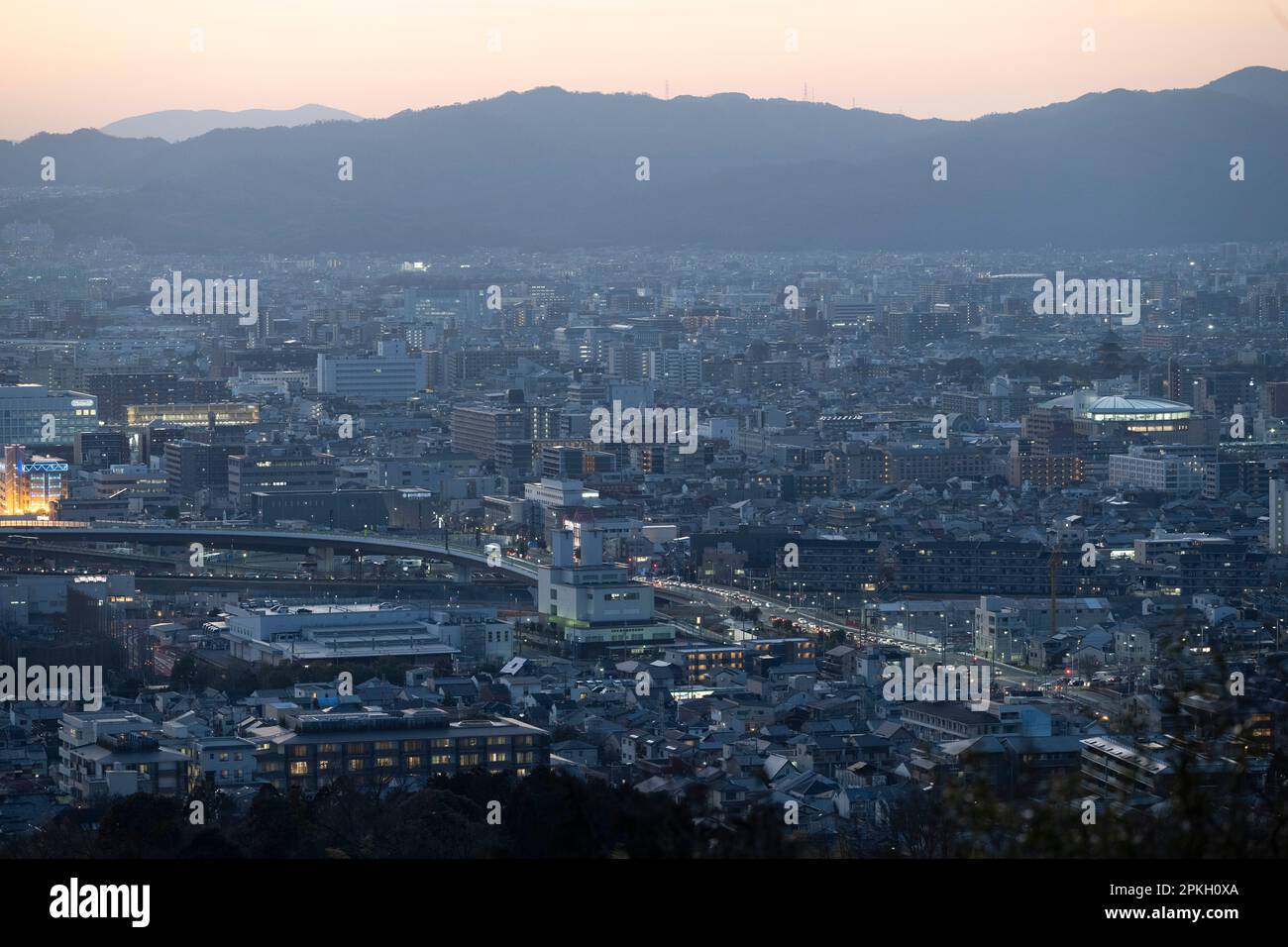 Kyoto, Japan. 6th Mar, 2023. The city skyline at sunset. Kyoto is the ...