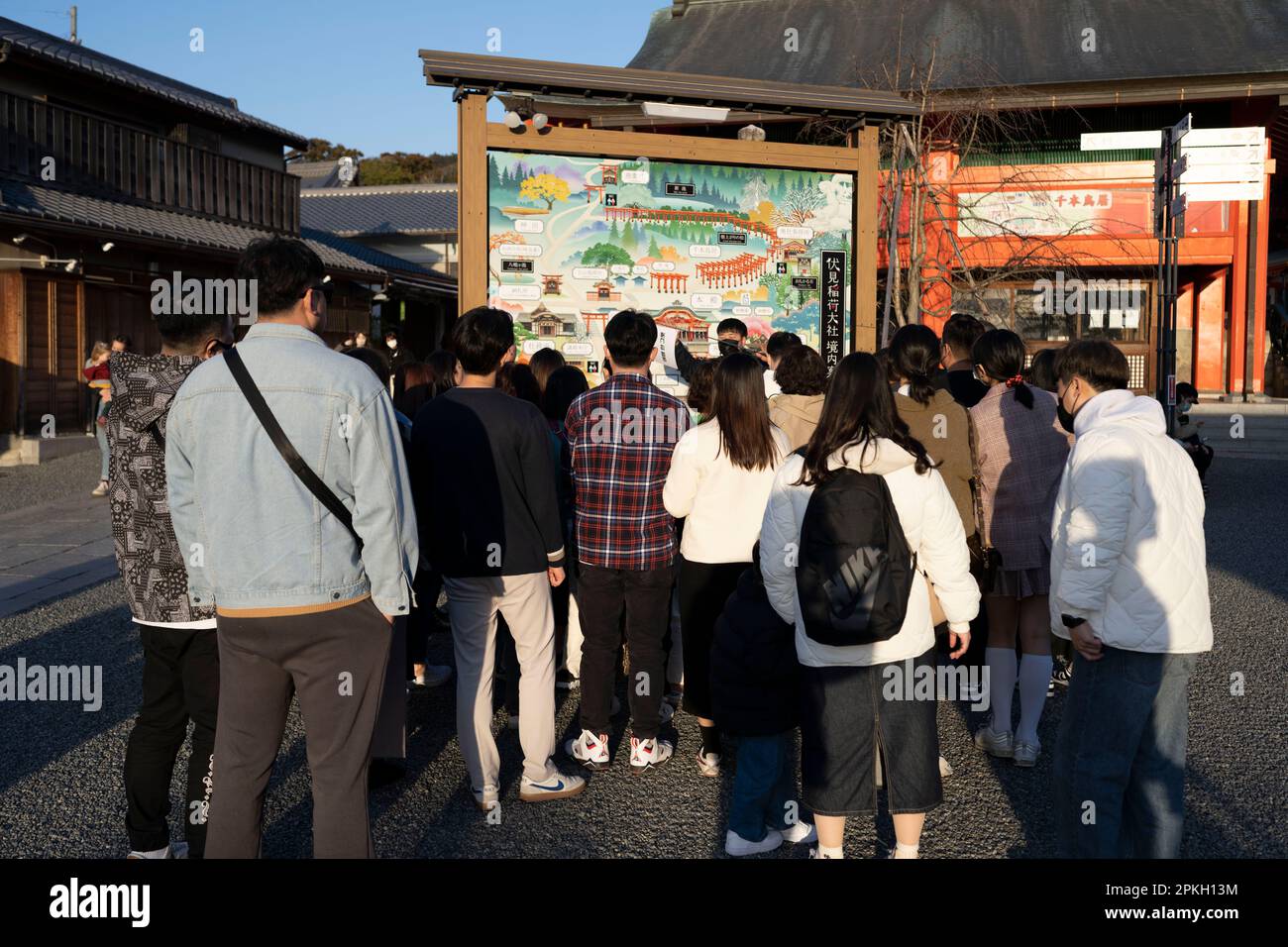 Kyoto, Japan. 6th Mar, 2023. A tour group at Mt. Inari.Fushimi Inari ...