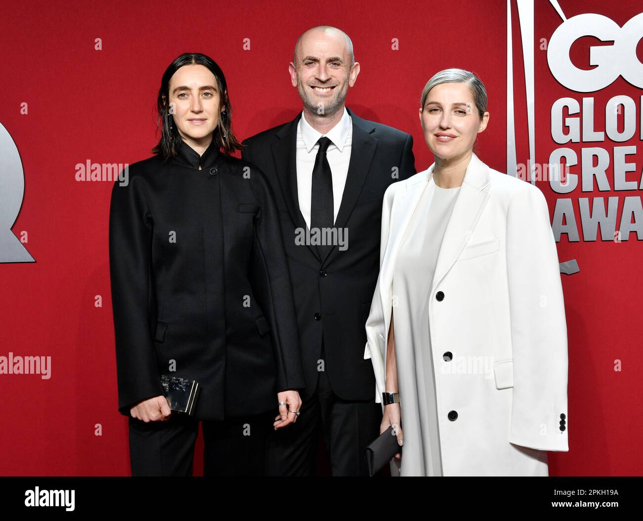 Jess Lomax, left, Jonathan Bottomley and Eva Serrano attend the GQ ...