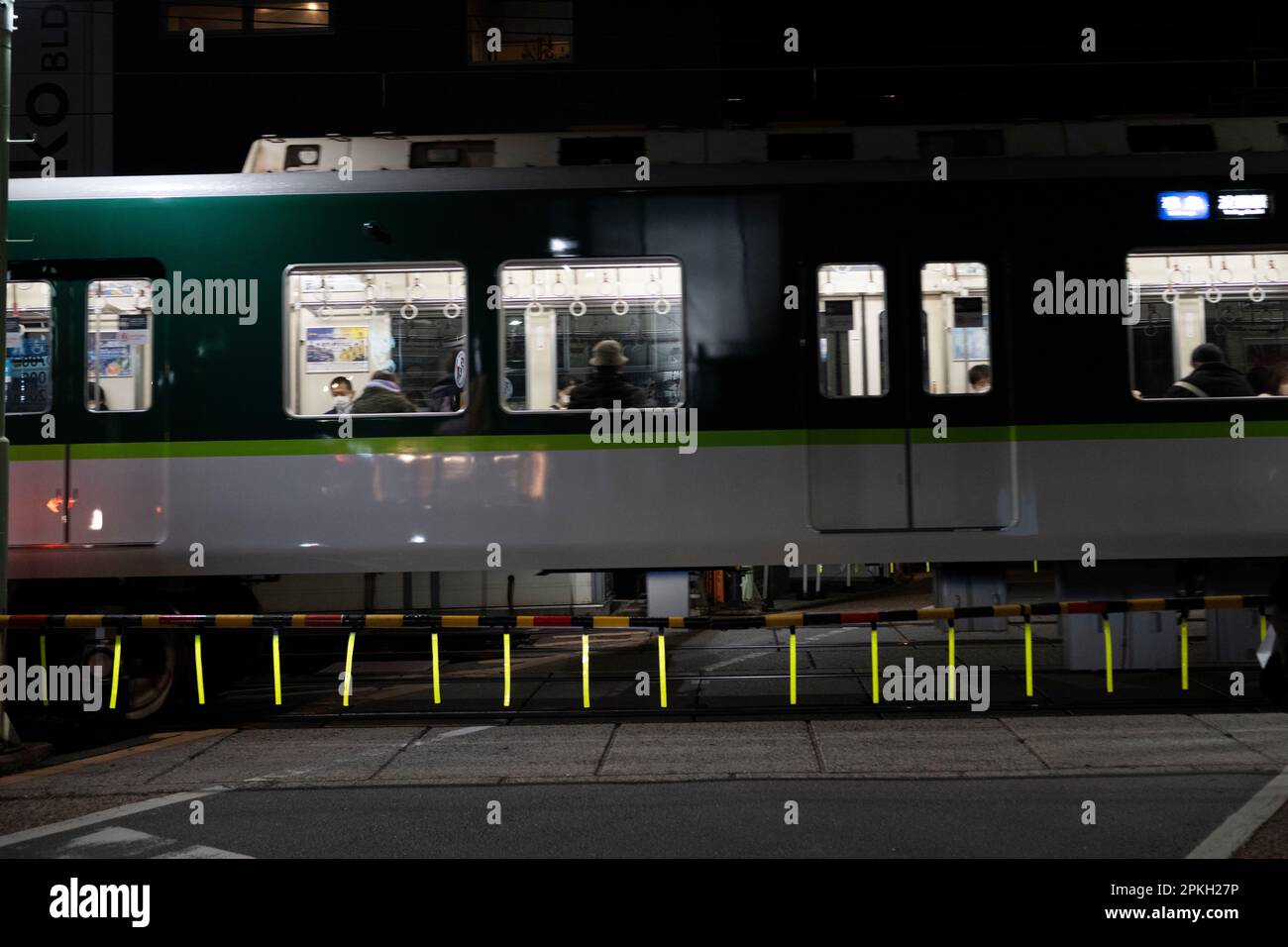 Kyoto, Japan. 6th Mar, 2023. A Keihan Main Line train passes through an ...