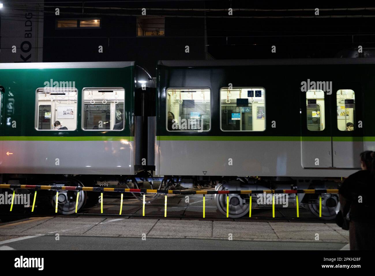 Kyoto, Japan. 6th Mar, 2023. A Keihan Main Line train passes through an ...