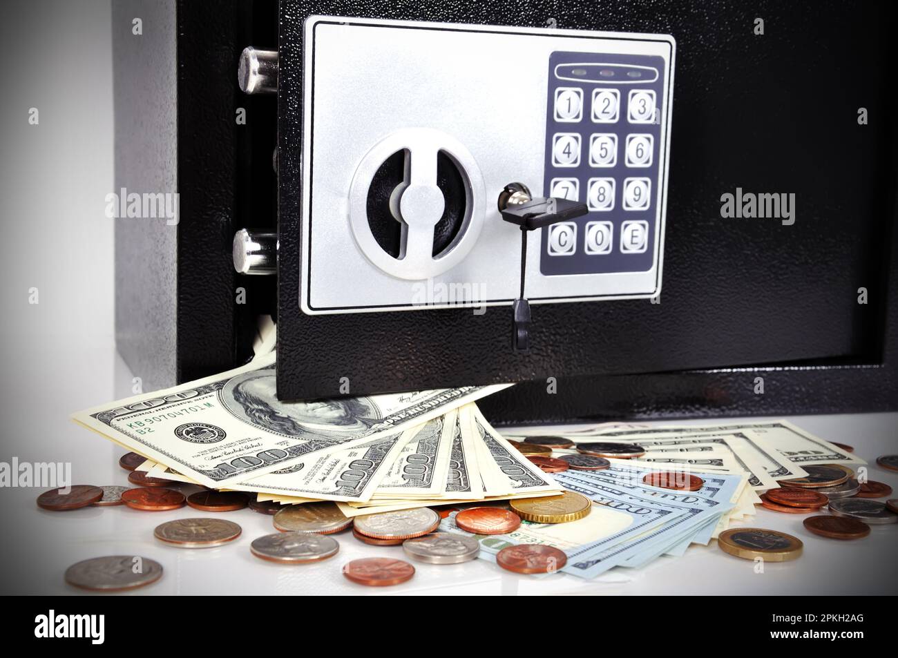 Dollars in safe deposit box hi-res stock photography and images - Alamy