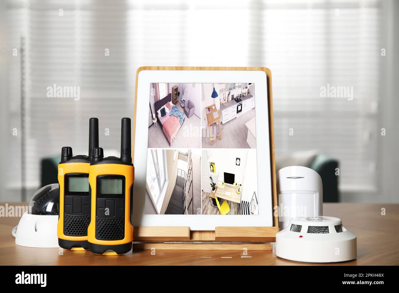 Tablet with view from CCTV cameras, walkie talkies, smoke and movement ...