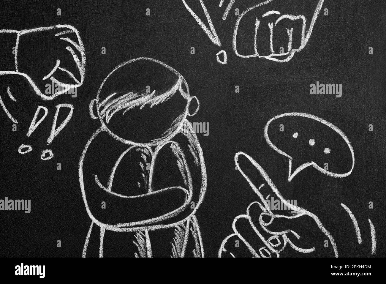 People bullying sad human drawn on blackboard Stock Photo - Alamy