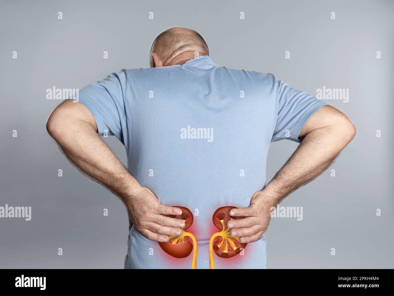 Senior man suffering from kidney pain on light grey background Stock ...