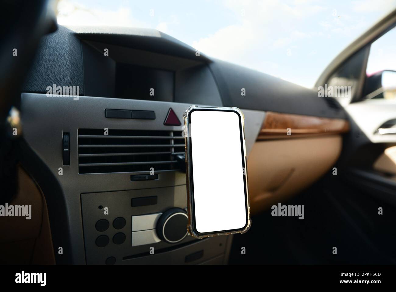 Holder with modern mobile phone in car. Mockup for design Stock Photo ...