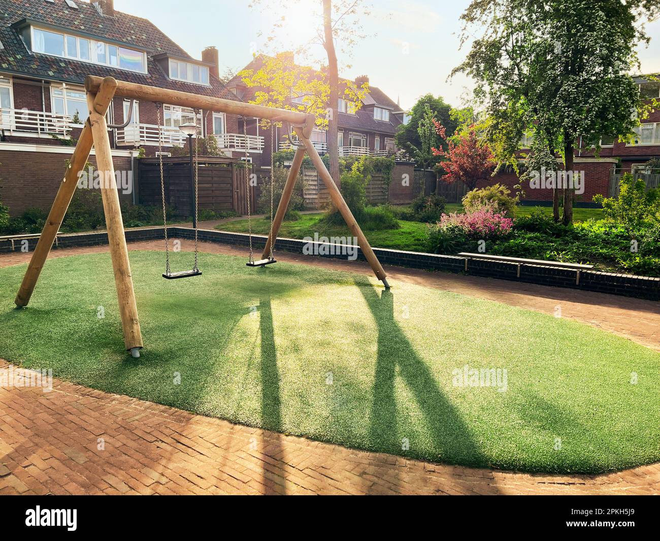Wooden swings hi-res stock photography and images - Alamy
