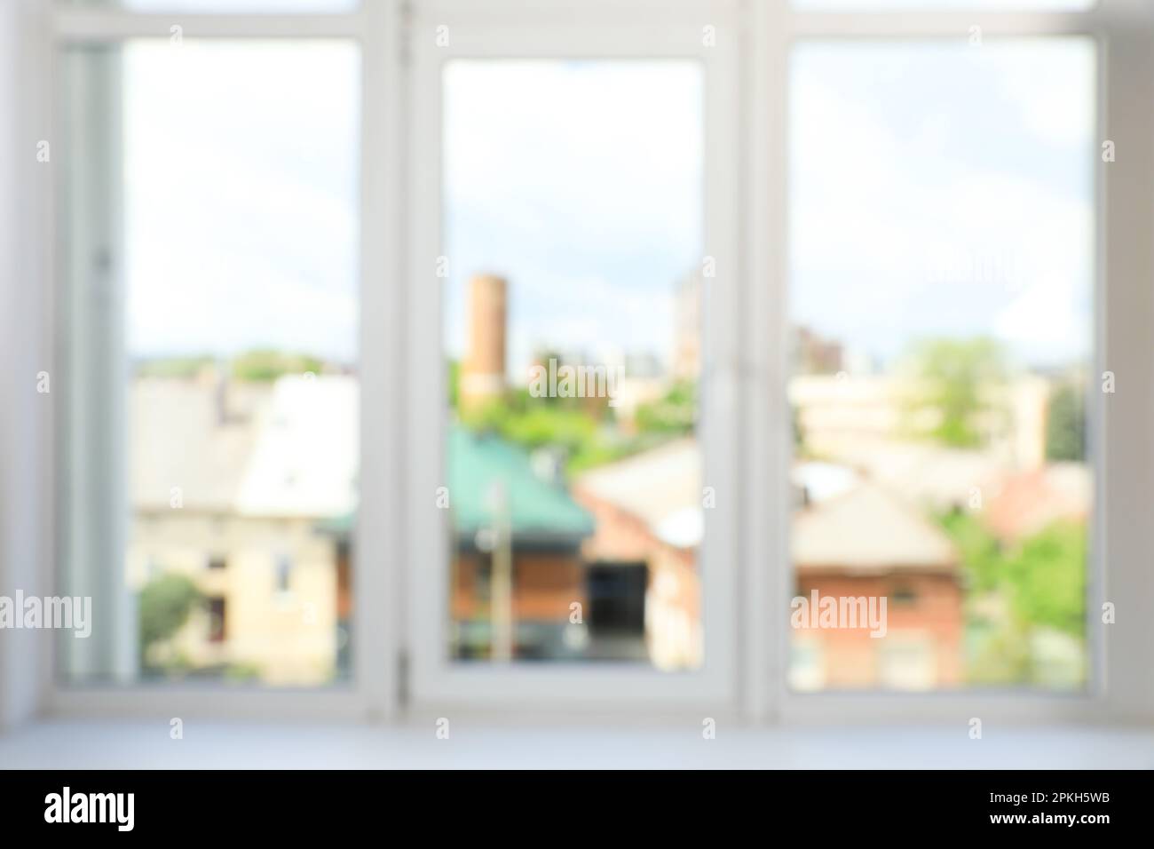 Blurred view of big window with white plastic frame Stock Photo - Alamy