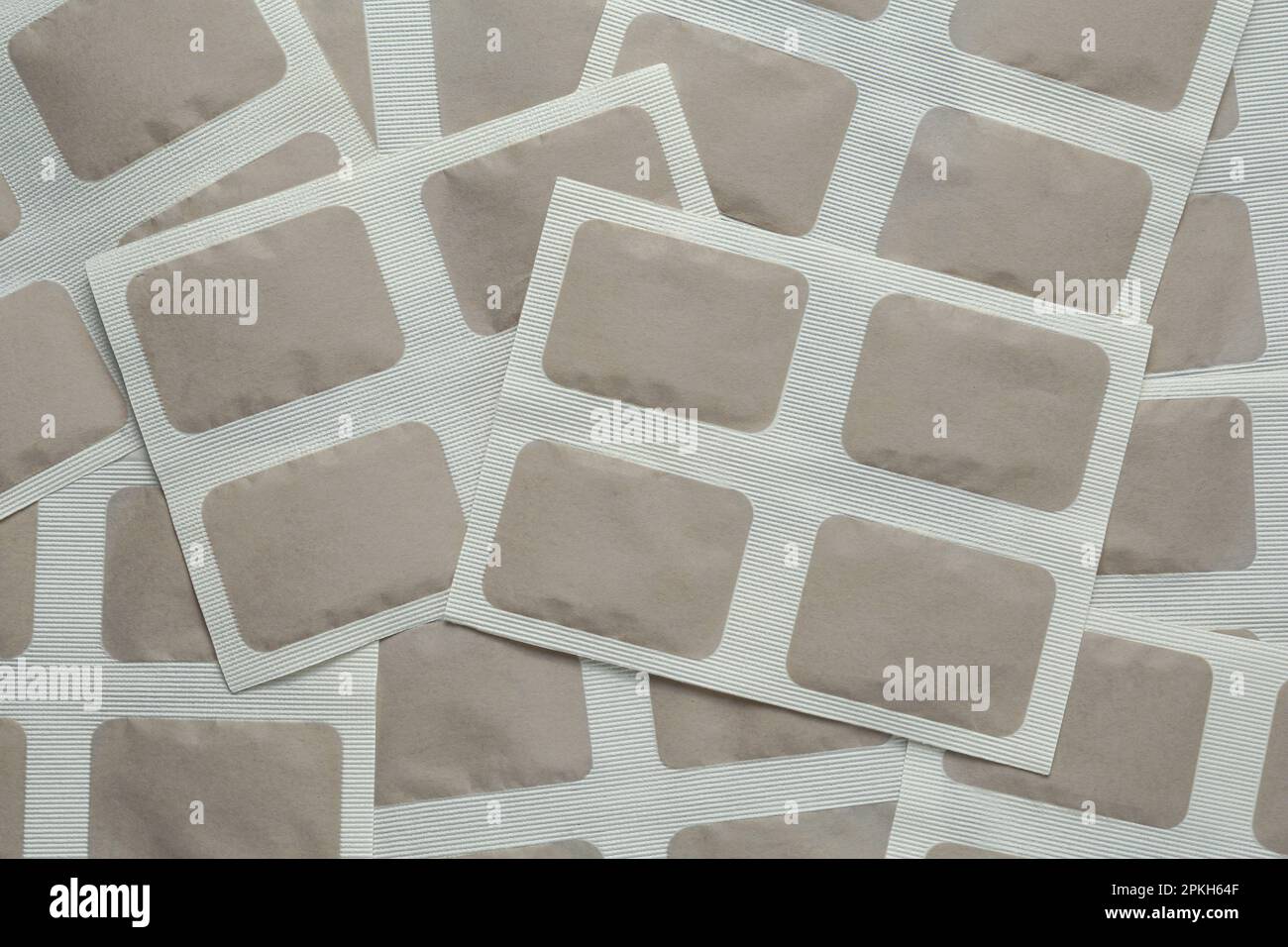 Mustard plasters as background, top view. Alternative medicine Stock ...