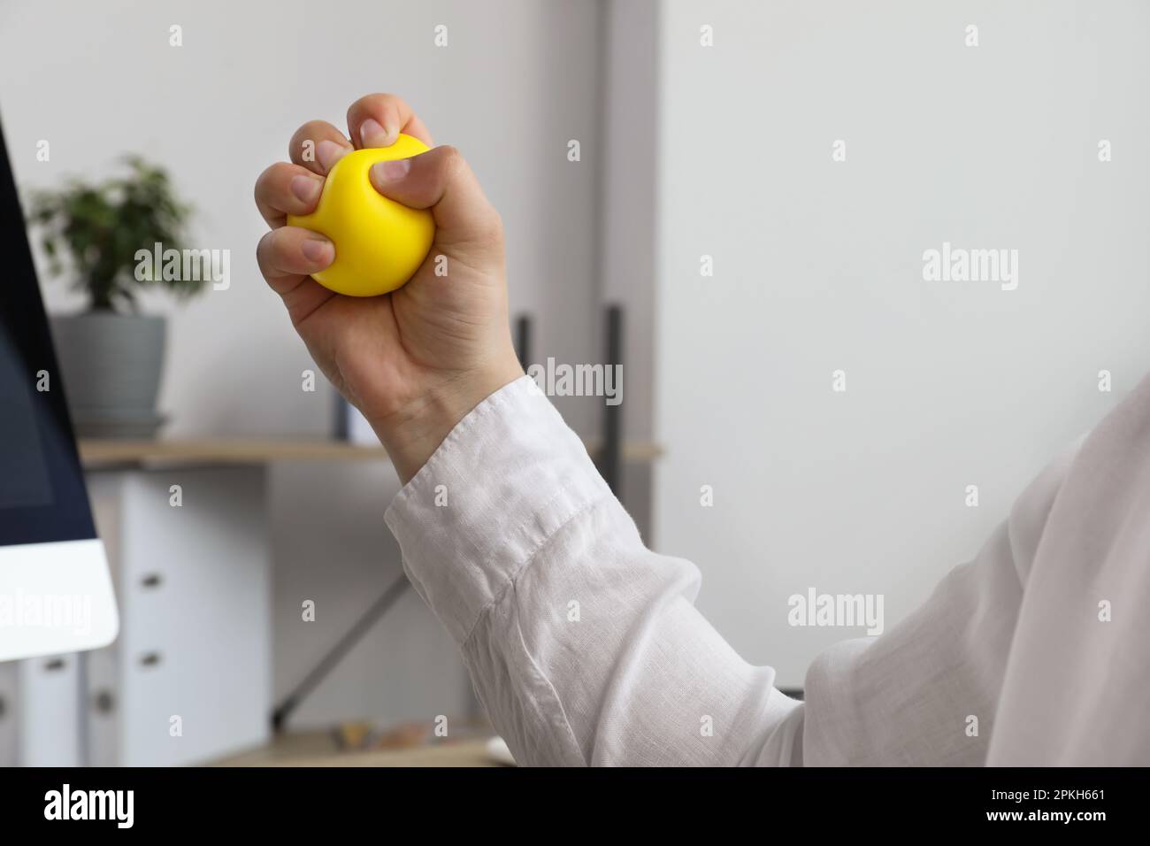 Yellow stress ball in hi-res stock photography and images - Alamy