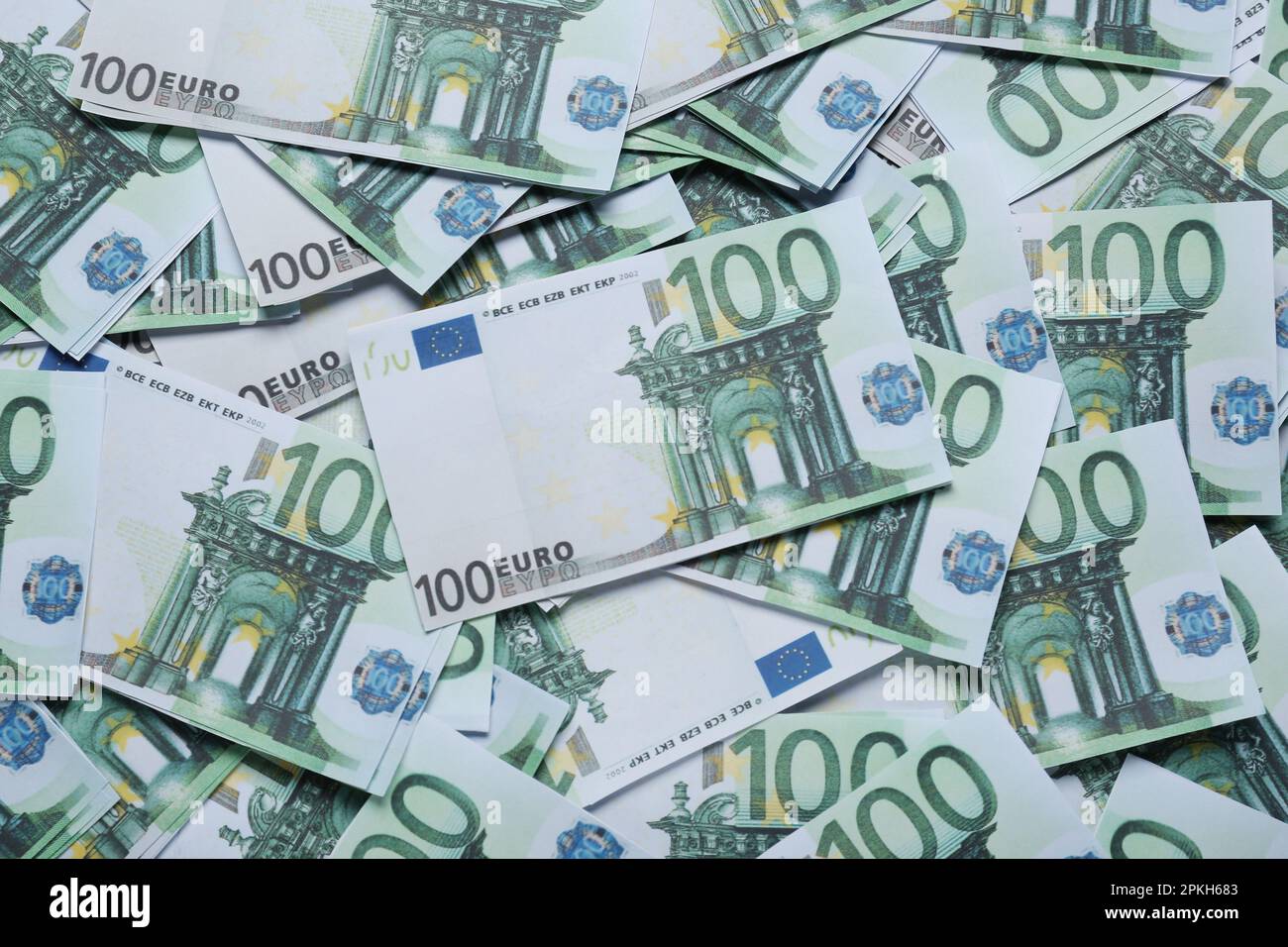 100 Euro banknotes as background, top view. Money exchange Stock Photo ...
