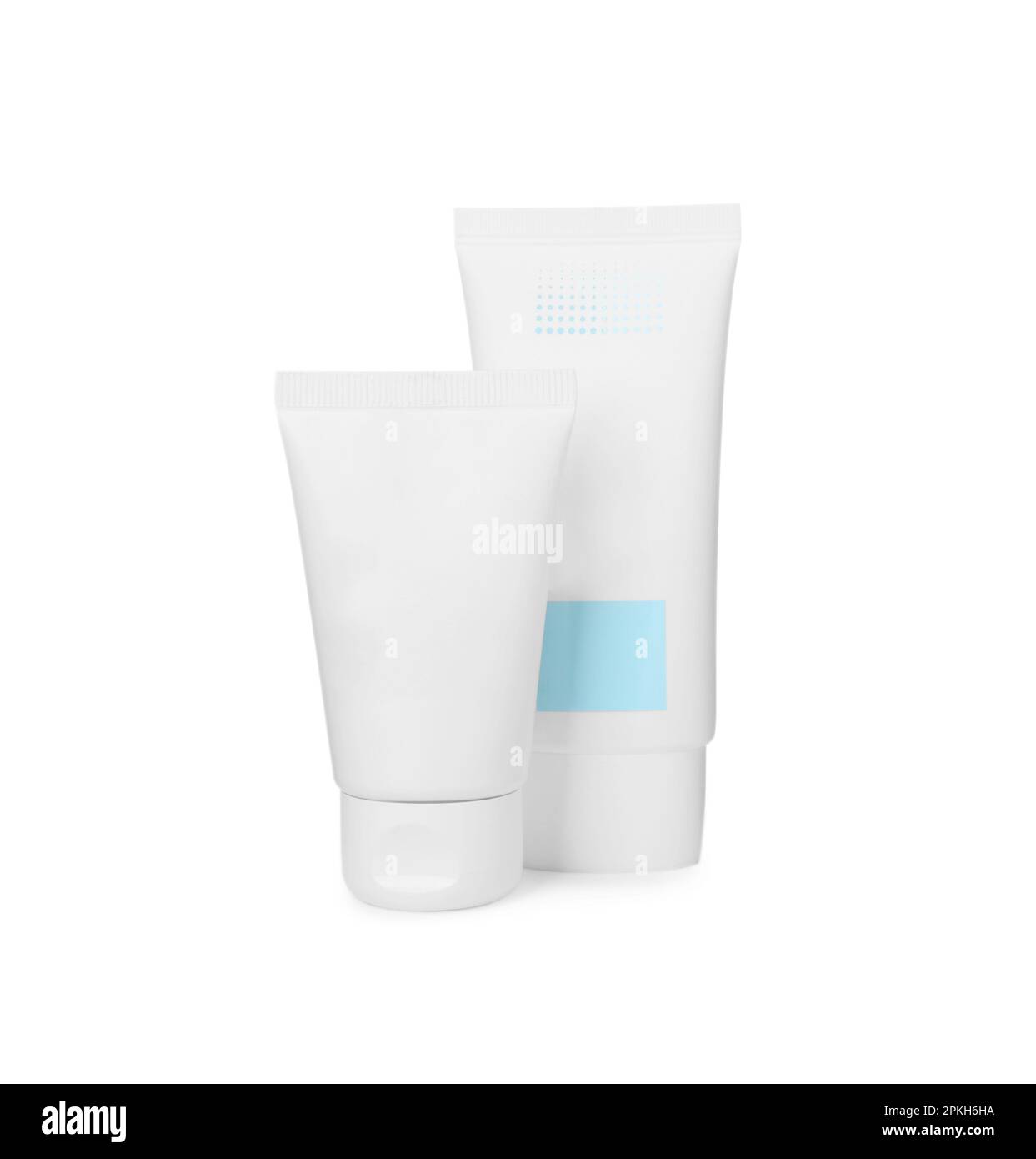 Tubes of different hand creams on white background. Mockup for design ...