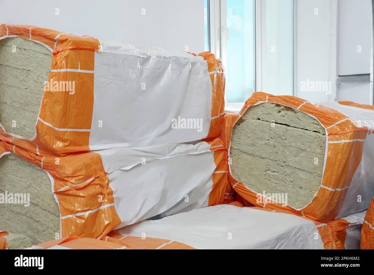 Packages of thermal insulation material in room Stock Photo - Alamy