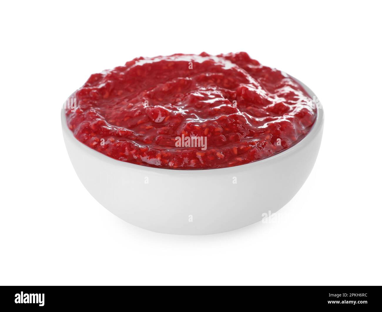 Raspberry puree in bowl on white background Stock Photo - Alamy