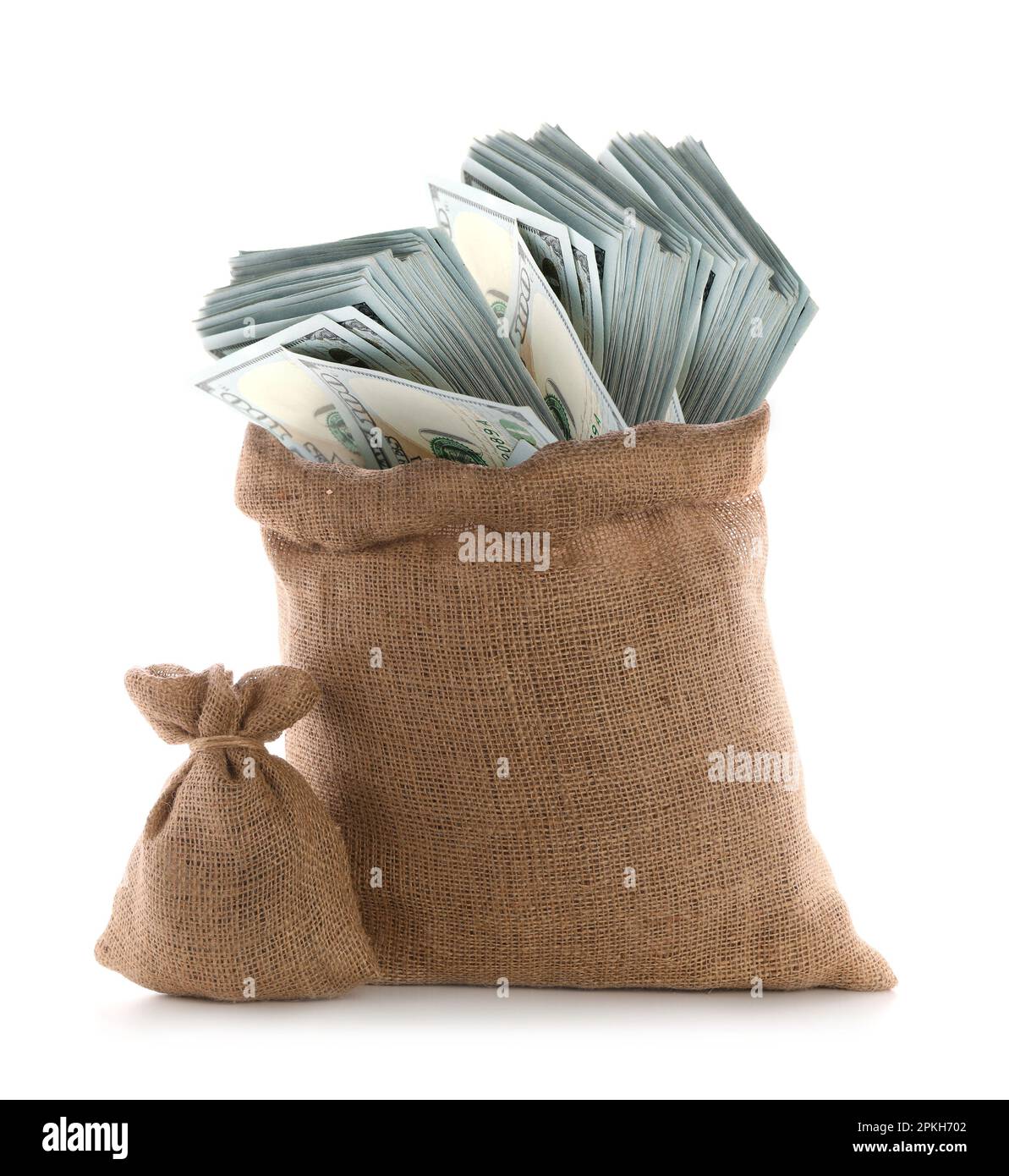 Burlap bags with many dollar banknotes on white background Stock Photo ...