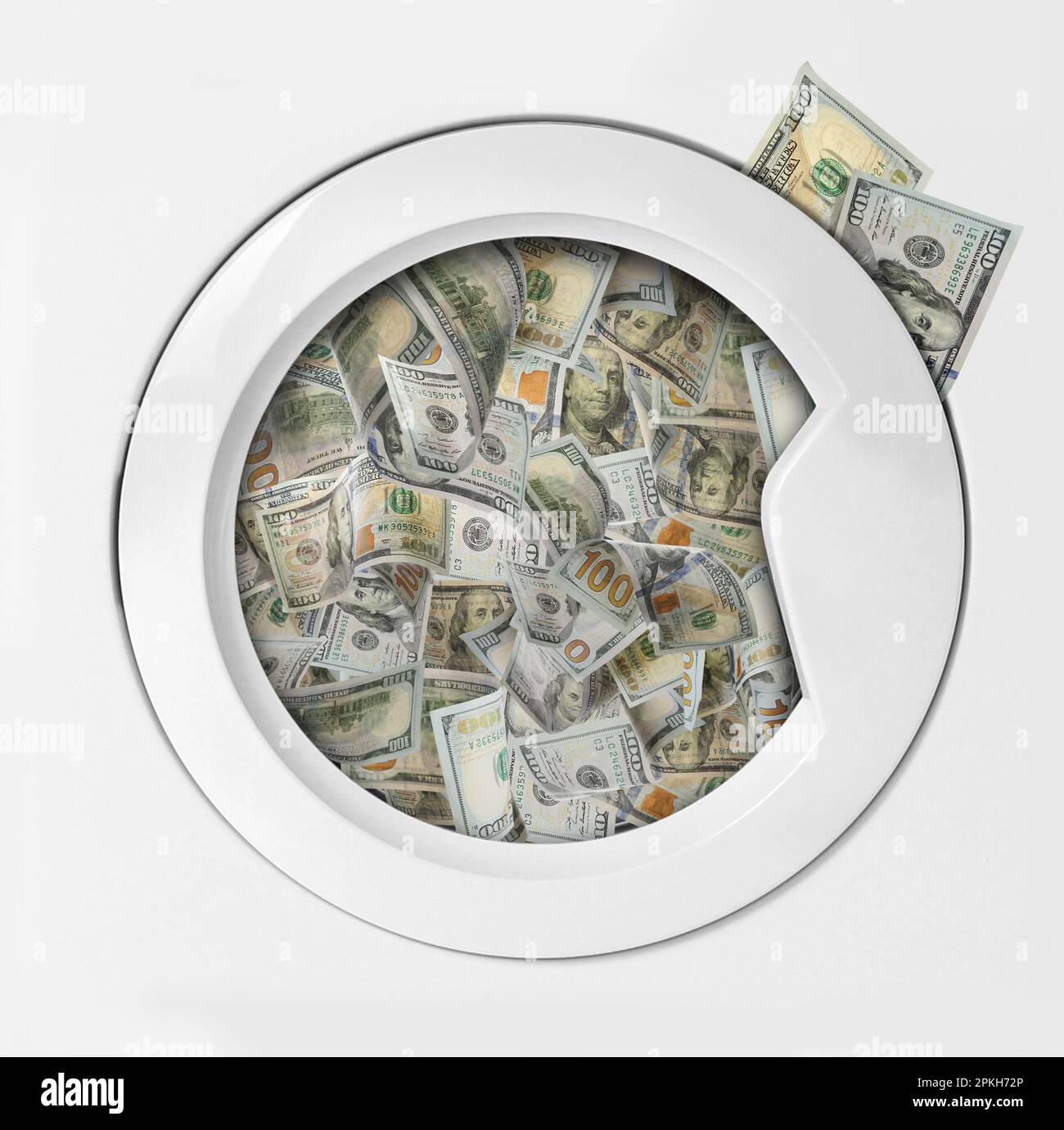 Money laundering. Many dollar banknotes in washing machine Stock Photo ...