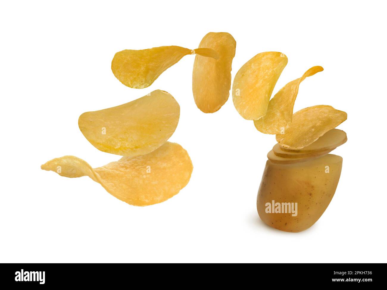 Raw potato turning into tasty crispy chips on white background Stock ...