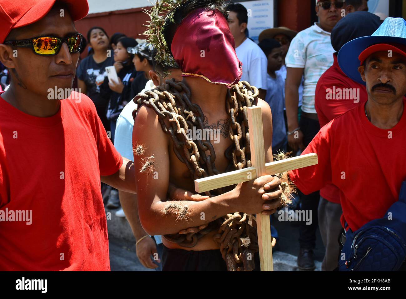 Atlixco, Mexico. 7th Apr, 2023. Hooded Penitents, wearing heavy chains ...